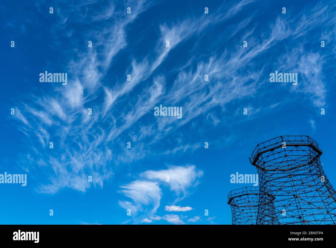 Blue sky with cirrus clouds, filigree ice clouds at high altitude ...