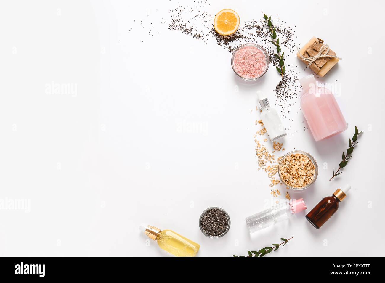 Natural cosmetics with ingredients on white background Stock Photo - Alamy