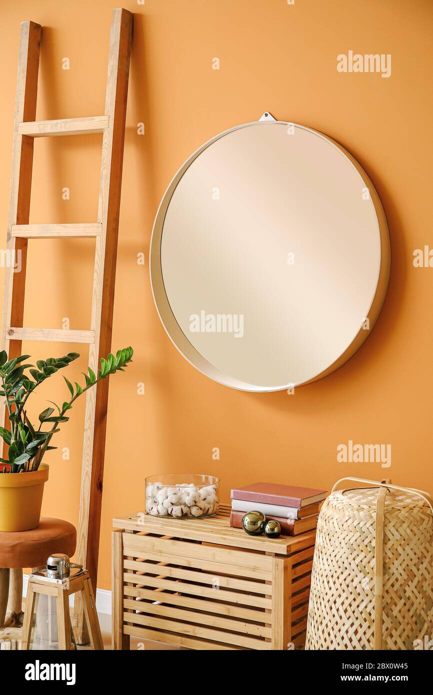 Interior of modern room with mirror Stock Photo - Alamy