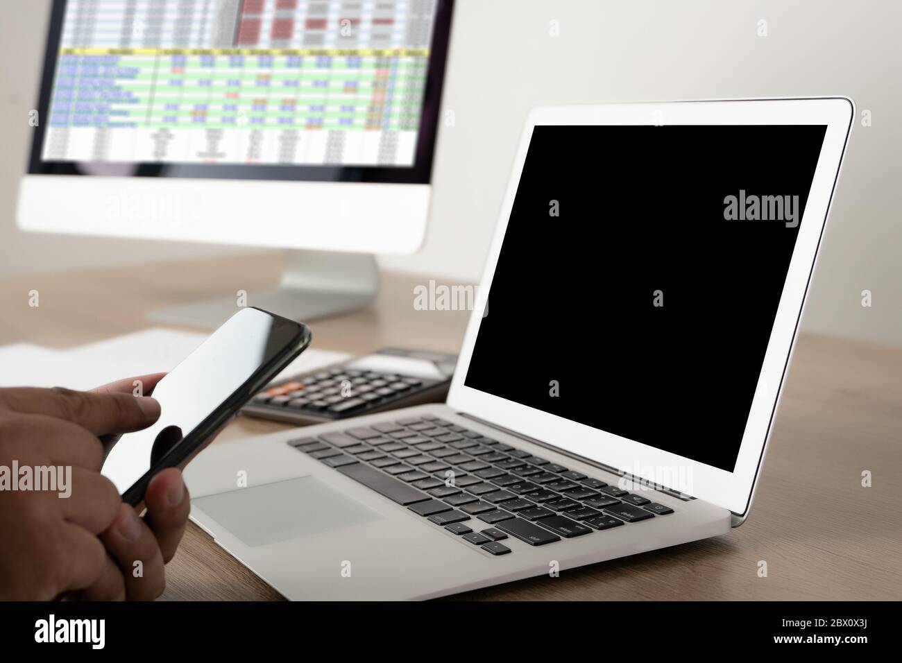 young man working Businessman using a desktop computer of the blank ...