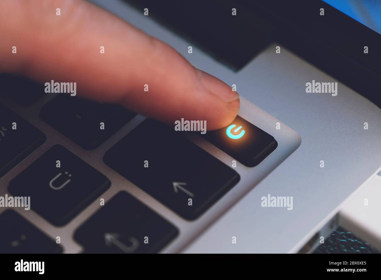 Closeup of Man's Finger Touching the Letter Power Key on Black Computer ...