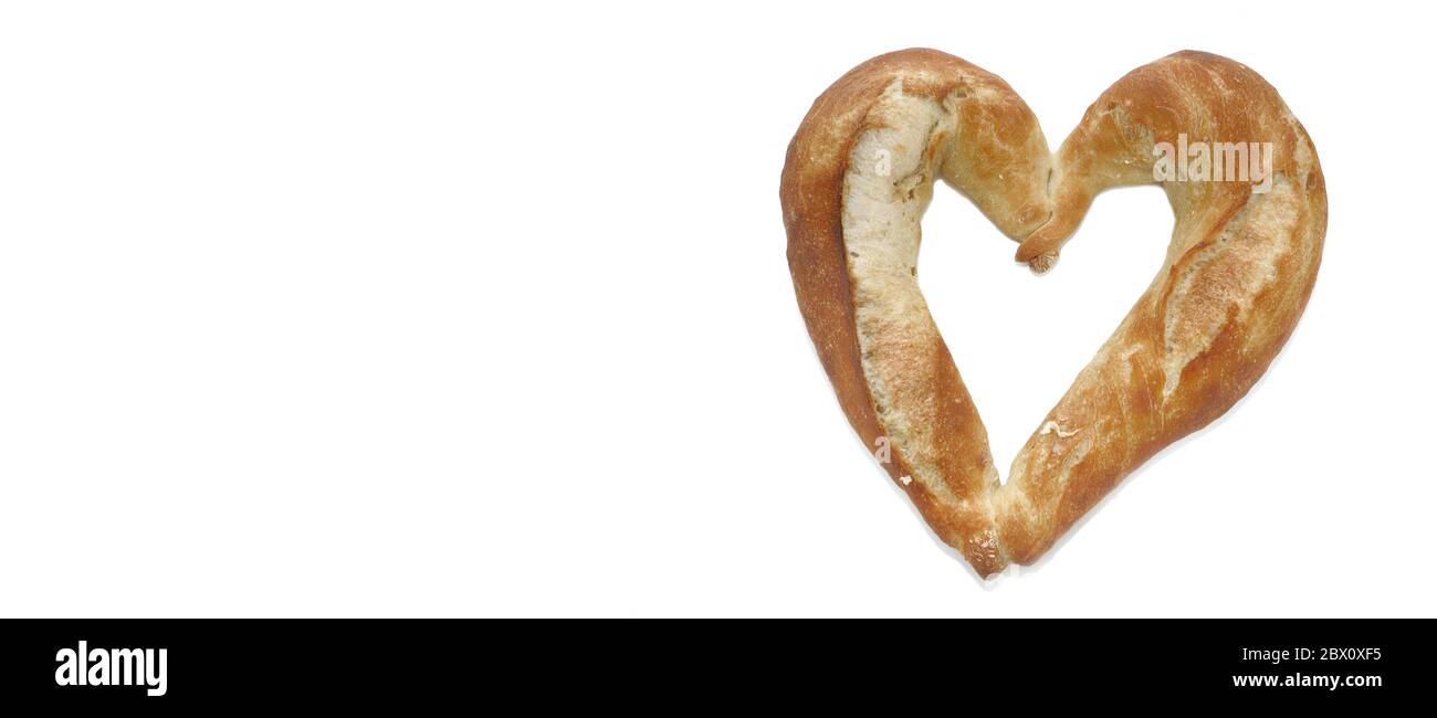 heart shaped bread isolated on white background Stock Photo - Alamy