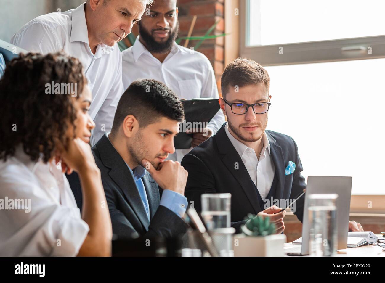 Coworkers Sitting Having Problem Thinking On Solution In Office Stock ...