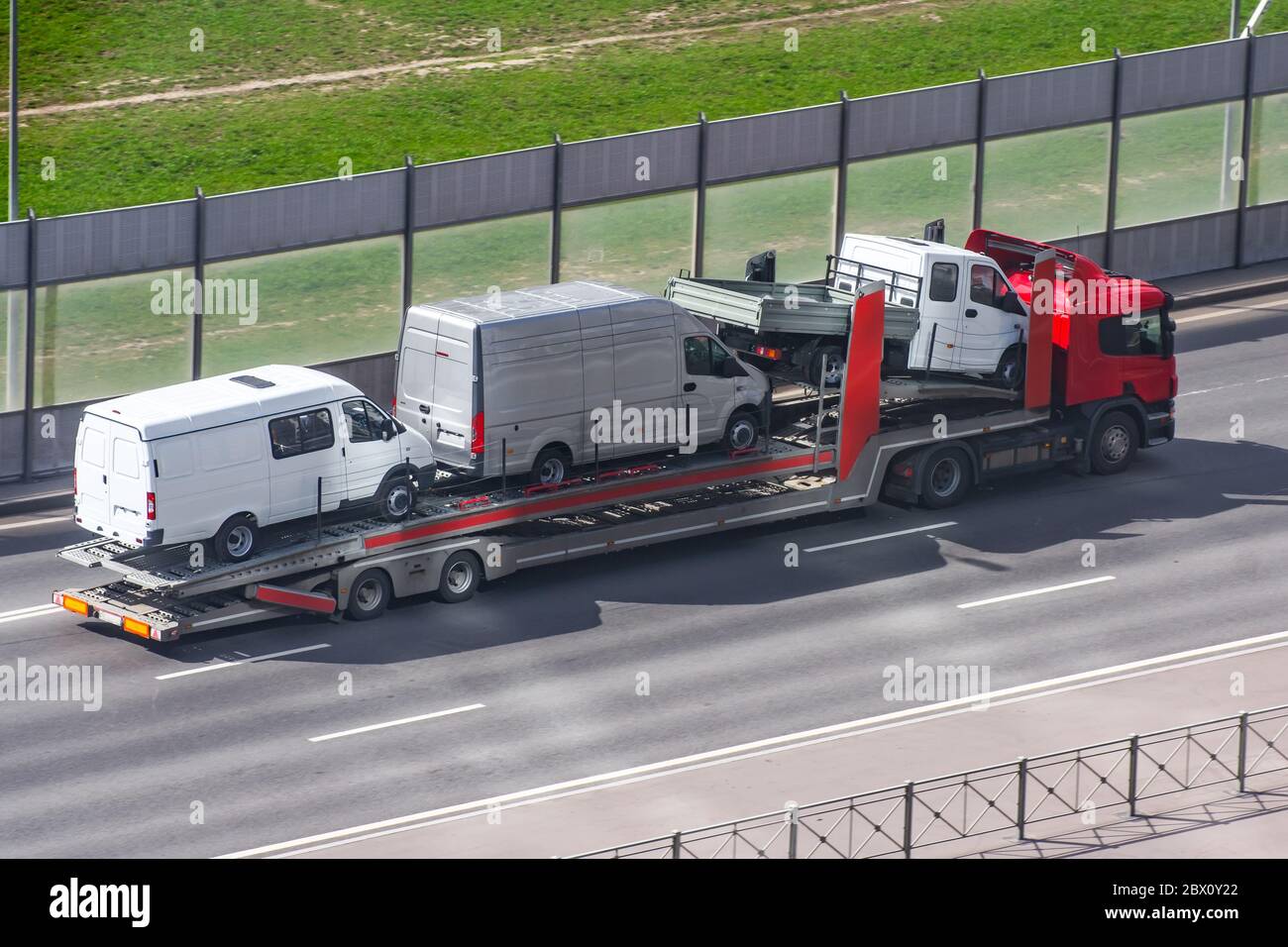 Heavy truck with trailer platform tow for transporting mini buses on ...