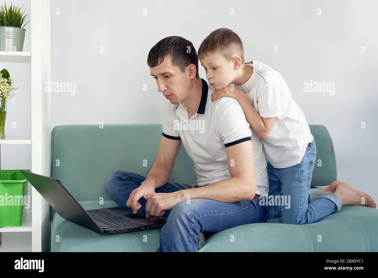 Father work home children computer hi-res stock photography and images ...