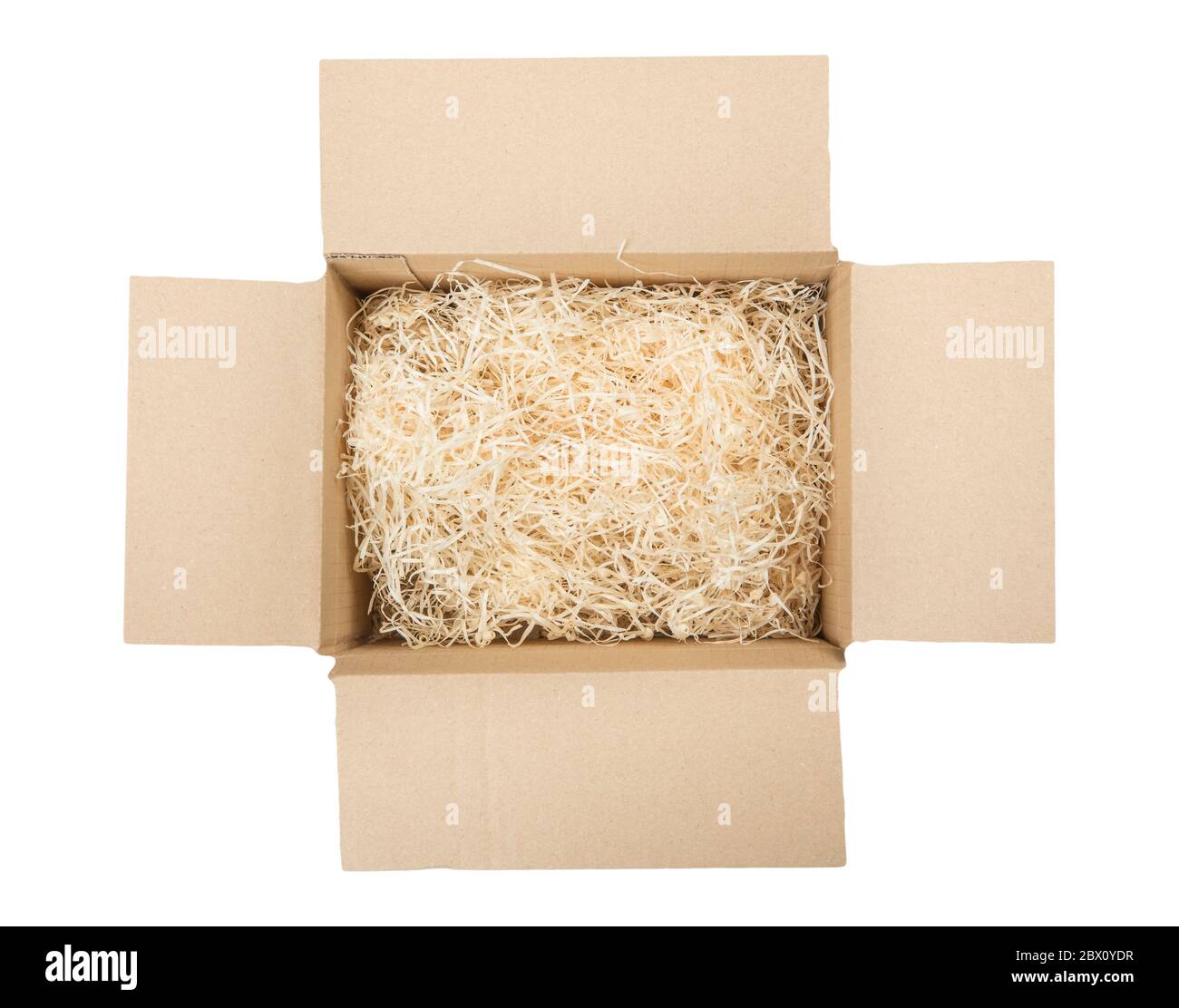 Top view of open cardboard box with shredded wood excelsior for filling ...