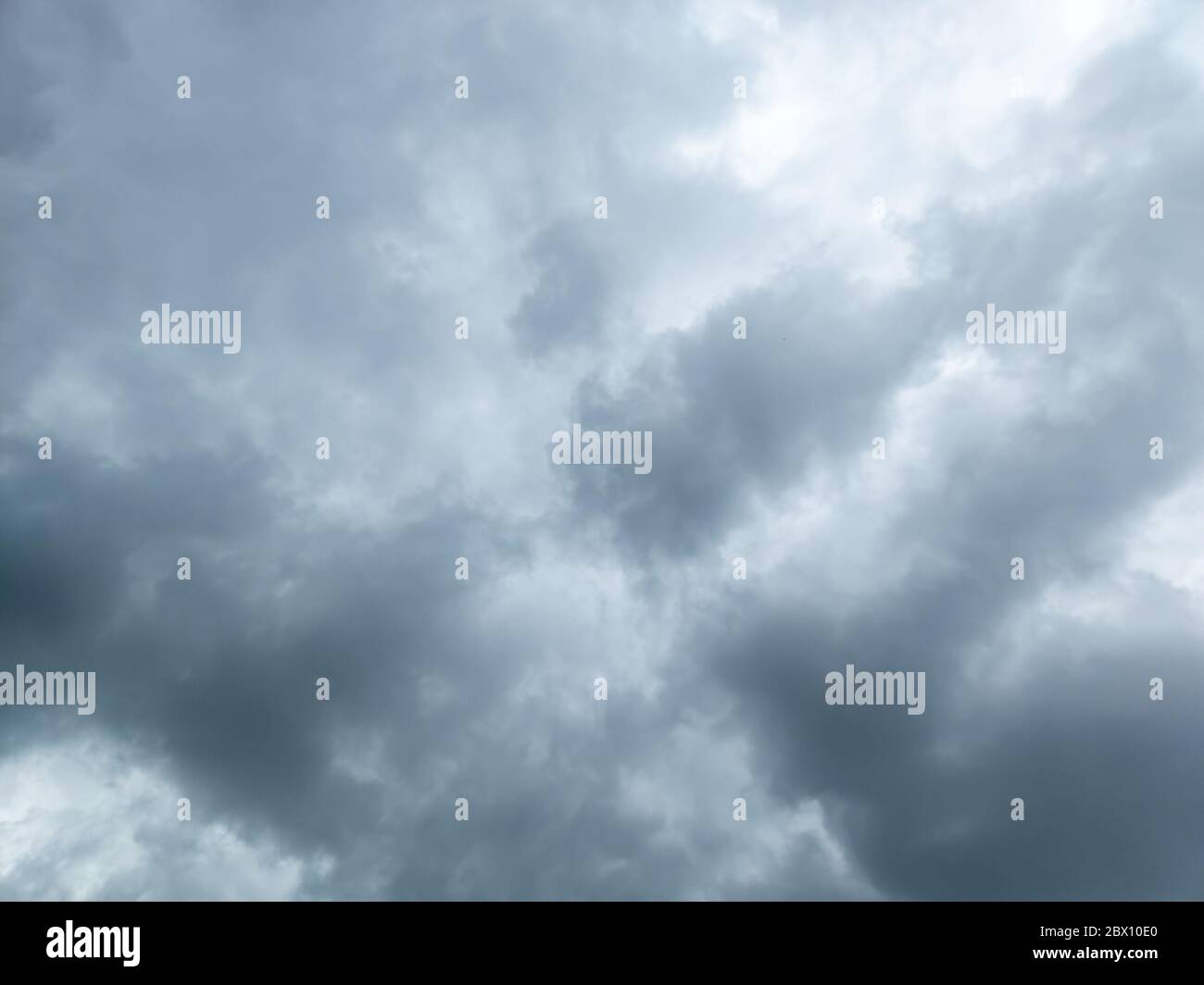 gray incoming storm clouds background, upward view Stock Photo - Alamy