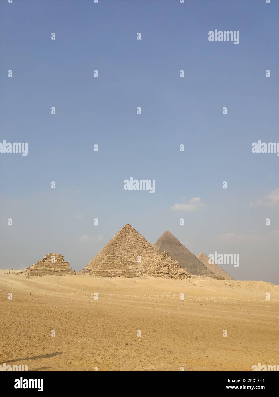 Egyptian pyramids in desert during the day Stock Photo - Alamy