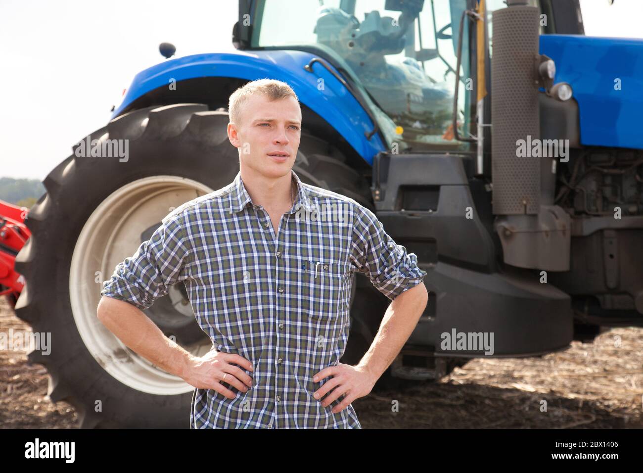 Man works near tractor in hi-res stock photography and images - Alamy