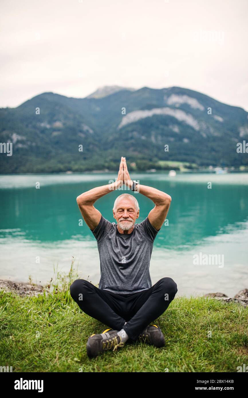 Old man doing yoga hi-res stock photography and images - Alamy
