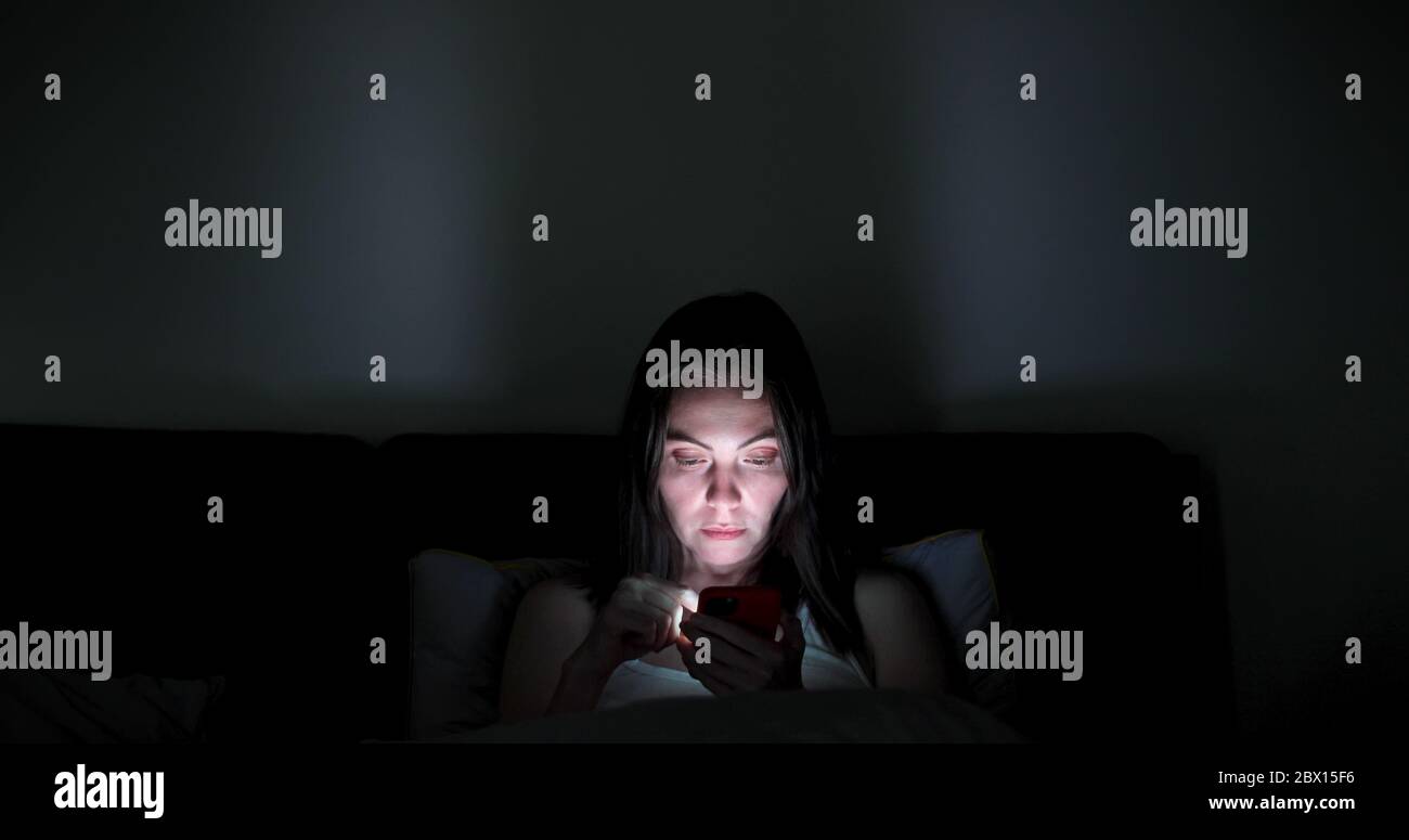 Young woman cellphone addiction hi-res stock photography and images - Alamy