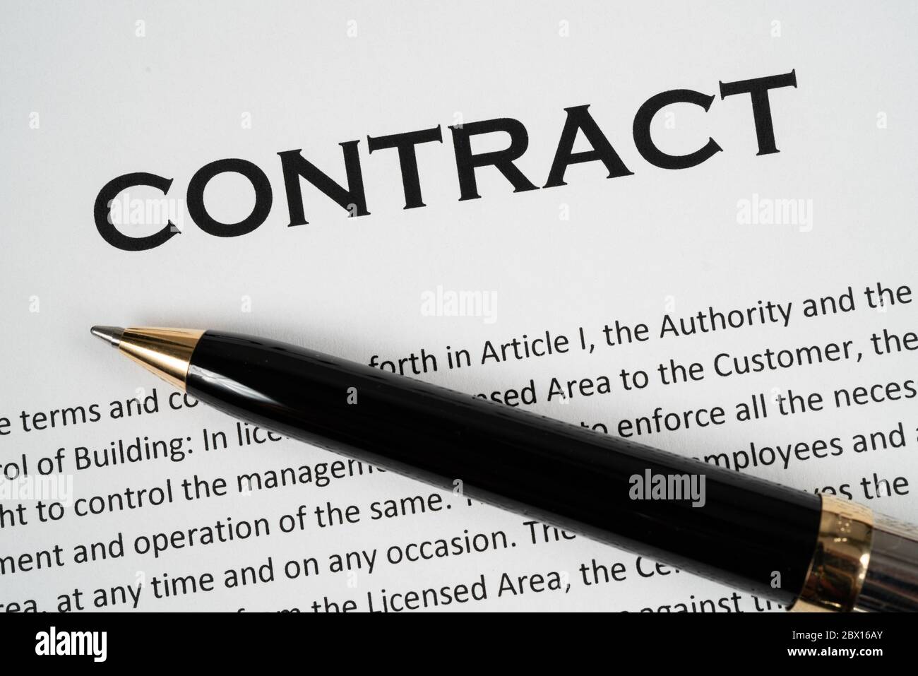 Close up of a Contract with pen ready to be signed Stock Photo - Alamy
