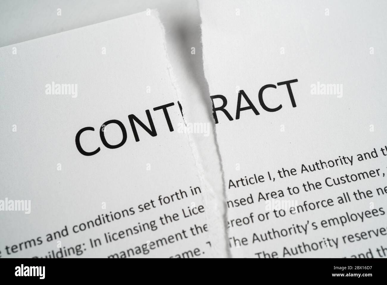 Contract torn up hi-res stock photography and images - Alamy