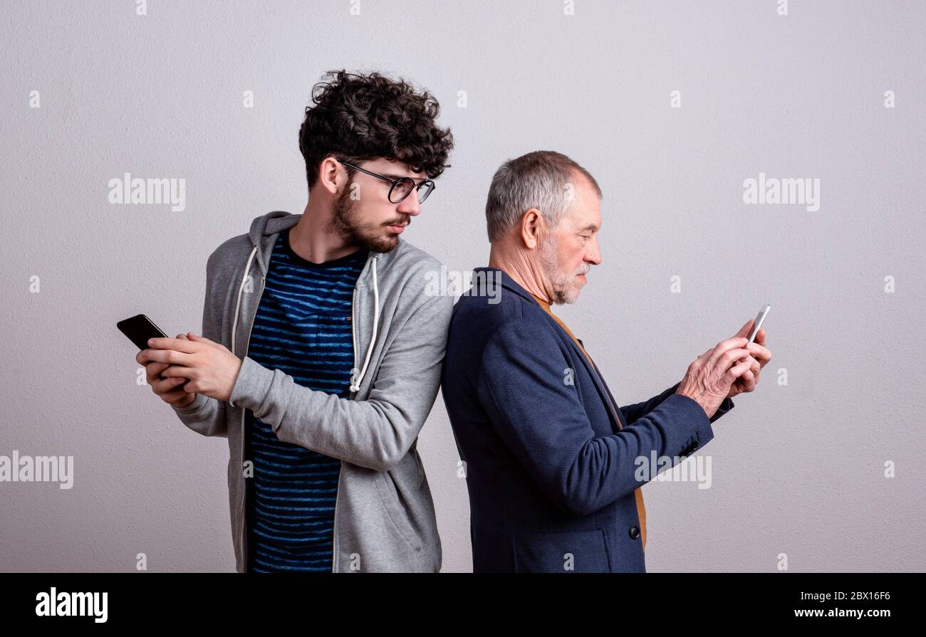 Happy father son smartphones hi-res stock photography and images - Alamy