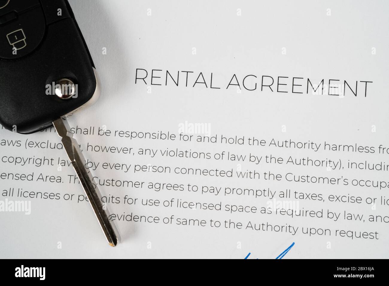 Car key on a rental agreement ready to be signed Stock Photo - Alamy