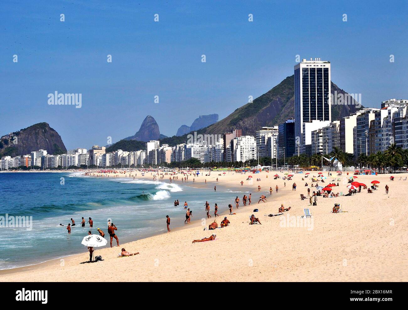 Copacabana beach and woman hi-res stock photography and images - Alamy