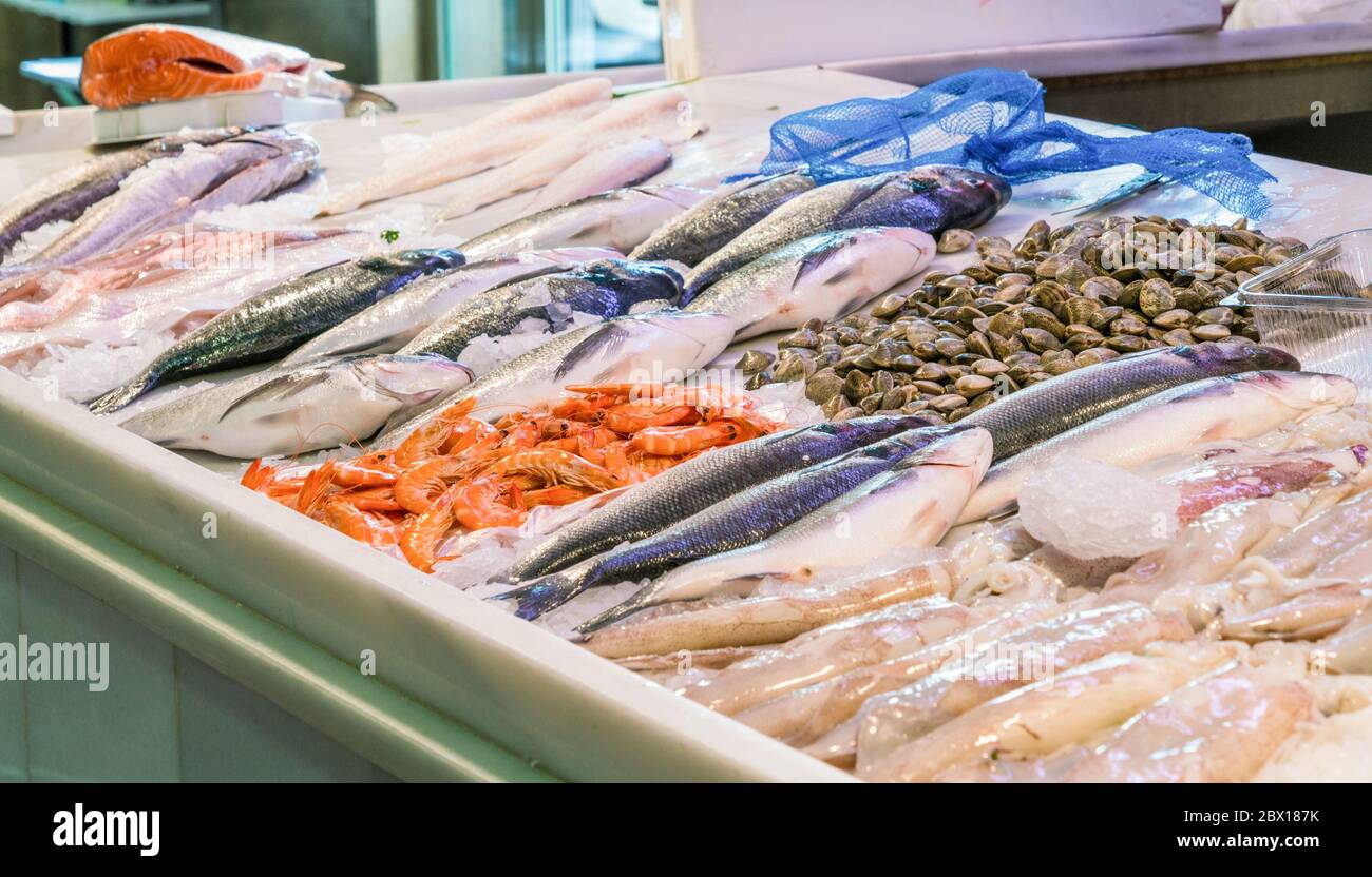 Fresh fish displayed at stall on local market Stock Photo - Alamy