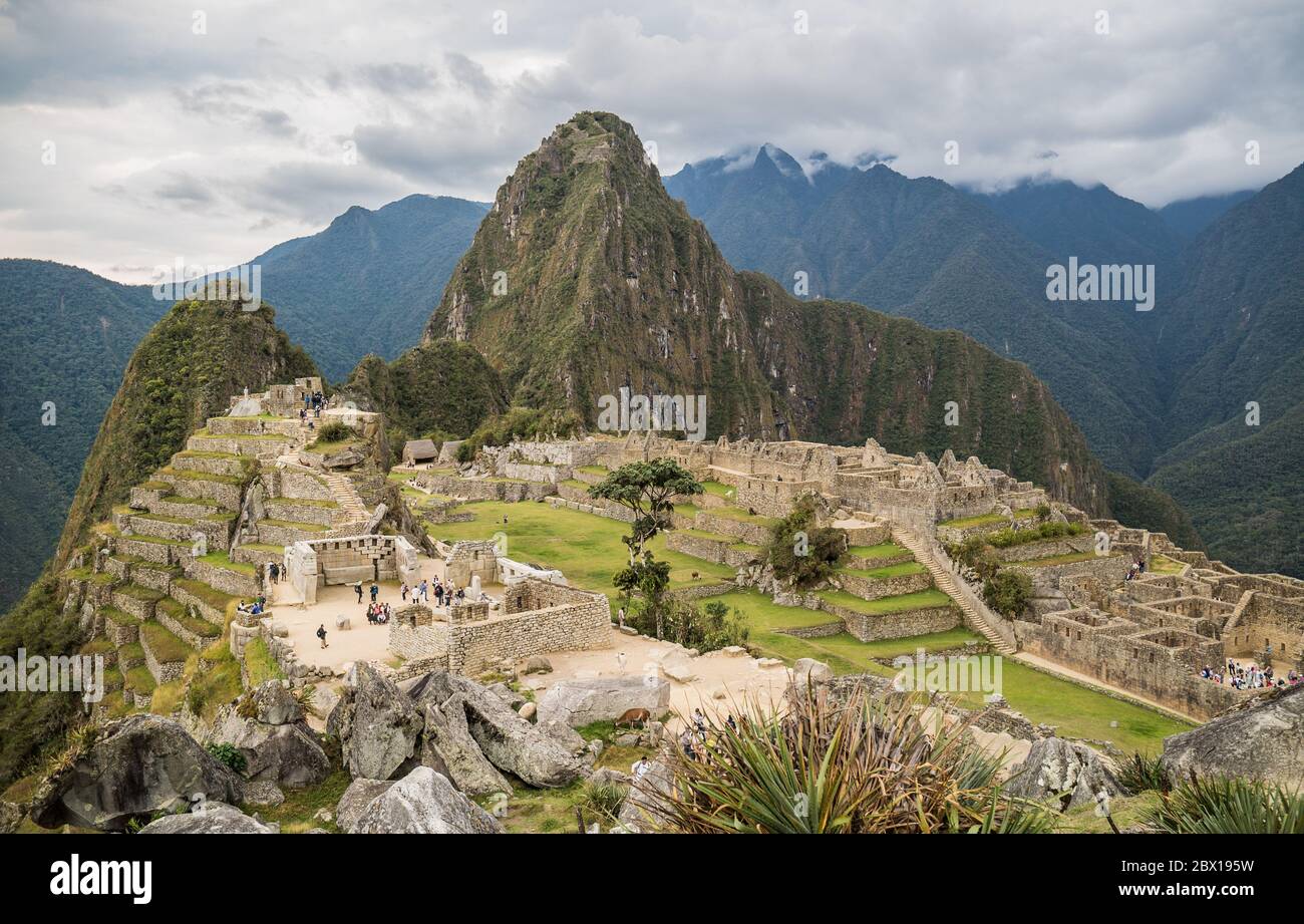 Machu Picchu in the Andes mountains of Peru Stock Photo - Alamy