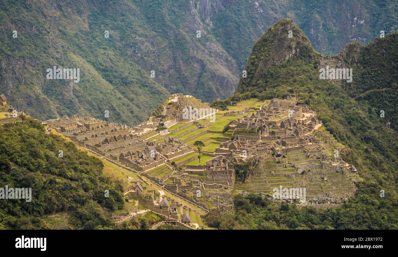 Machu Picchu in the Andes mountains of Peru Stock Photo - Alamy