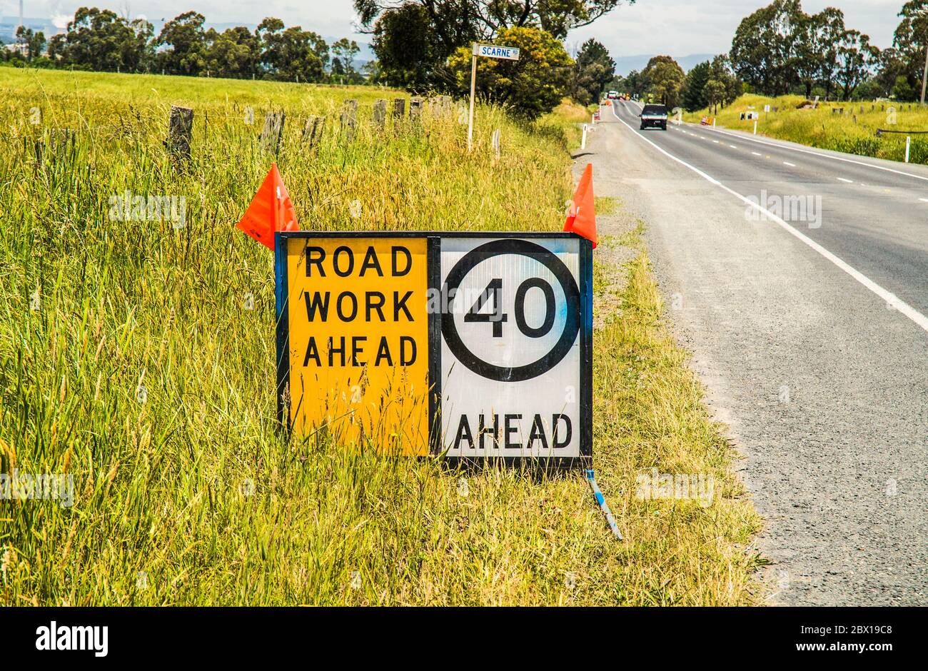 Road work sign, Road Work Ahead, with maximum 40 kilometer on a ...