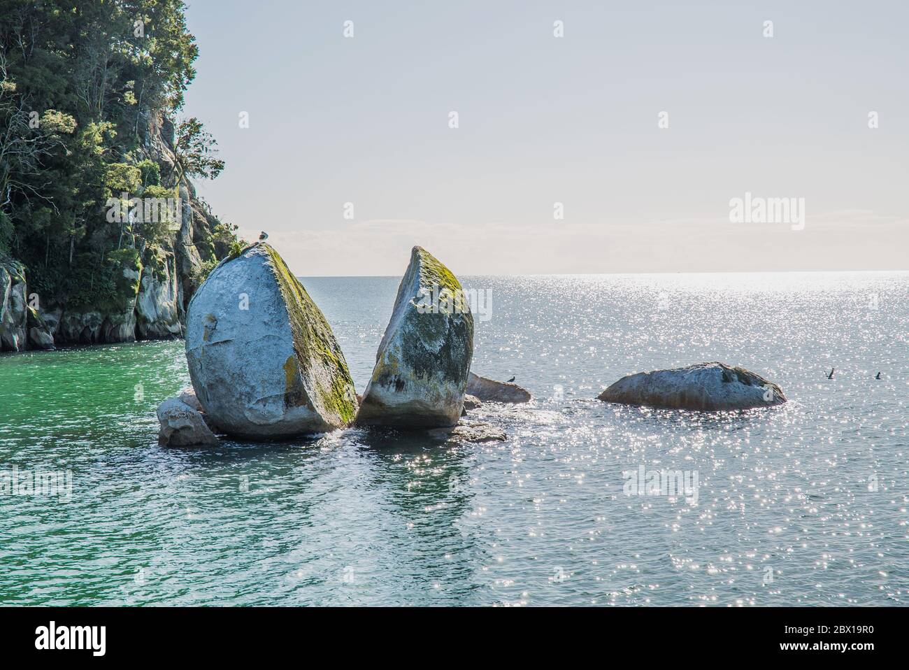 Split apple rock beach hi-res stock photography and images - Alamy