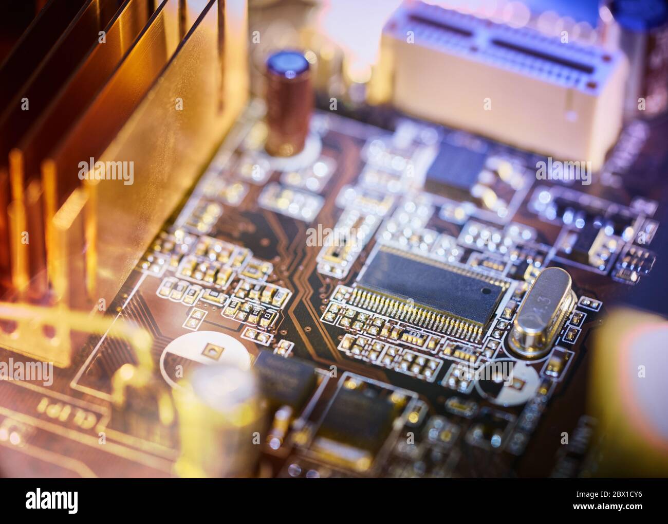 Computer motherboard background with blur neon multicolor glow Stock ...