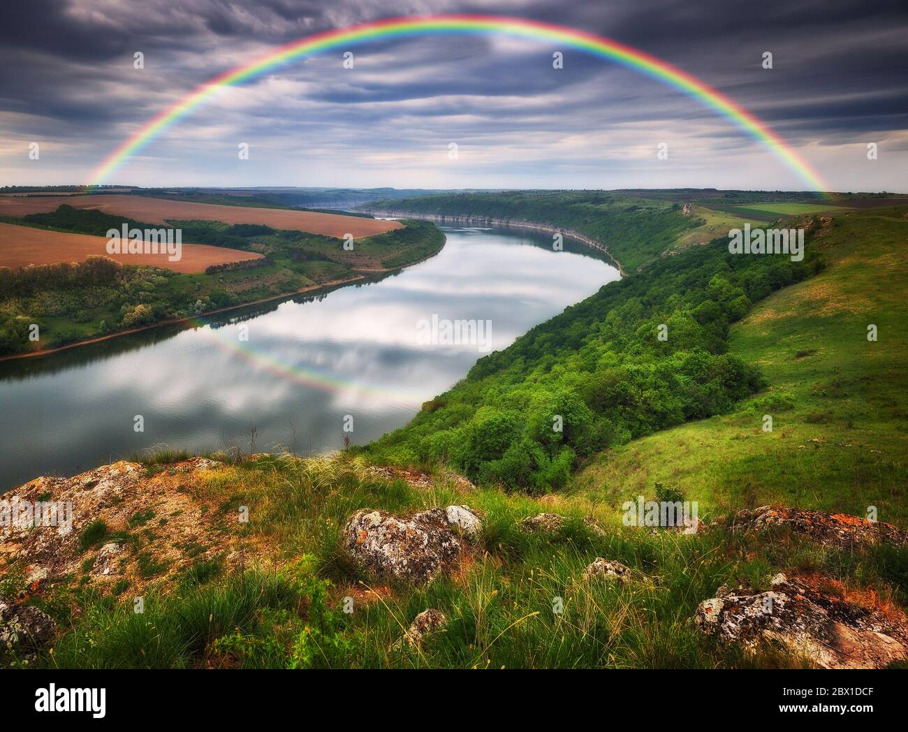 colorful rainbow over river canyon Stock Photo - Alamy