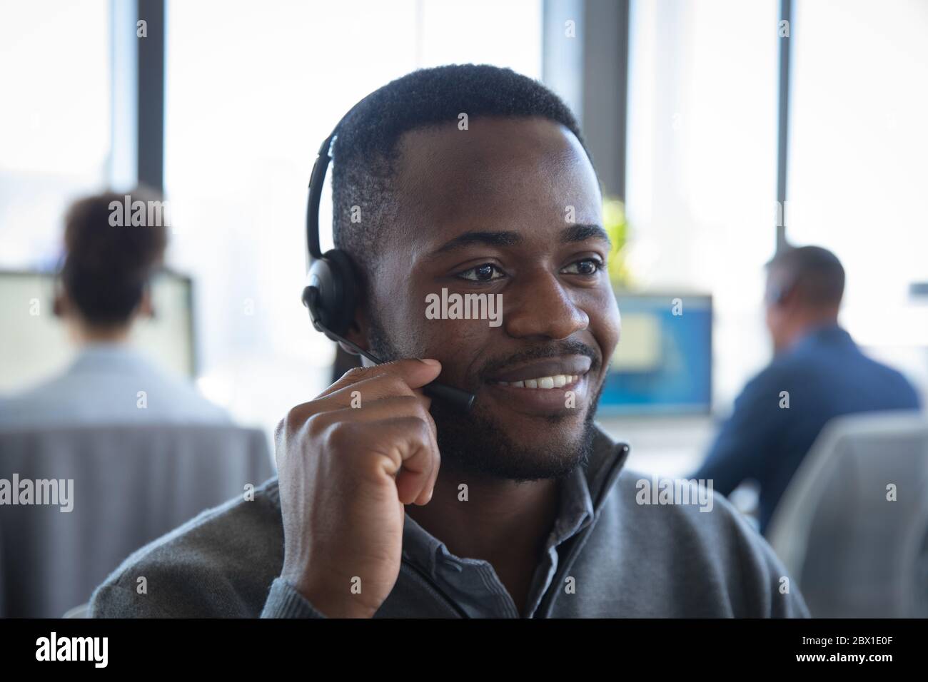 Man wearing headset hi-res stock photography and images - Alamy