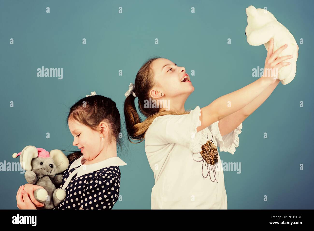 Child care. Sisters or best friends play with toys. Sweet childhood ...