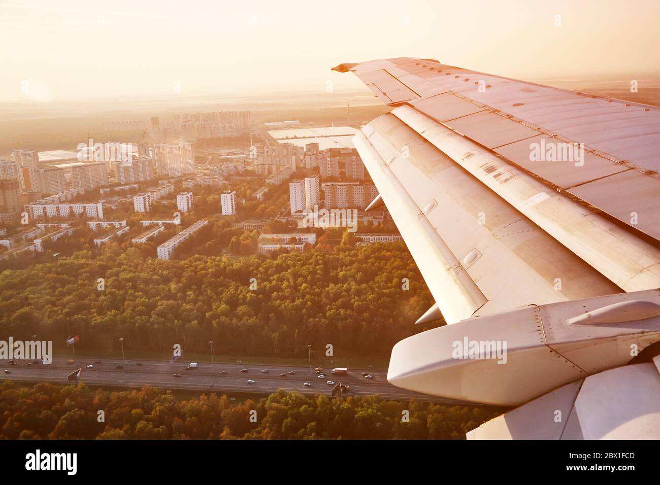 view from an airplane window down to the ground Stock Photo - Alamy