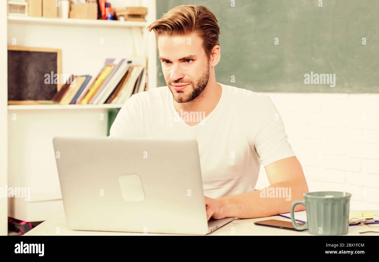 library online. college life. school teacher use laptop and smartphone ...