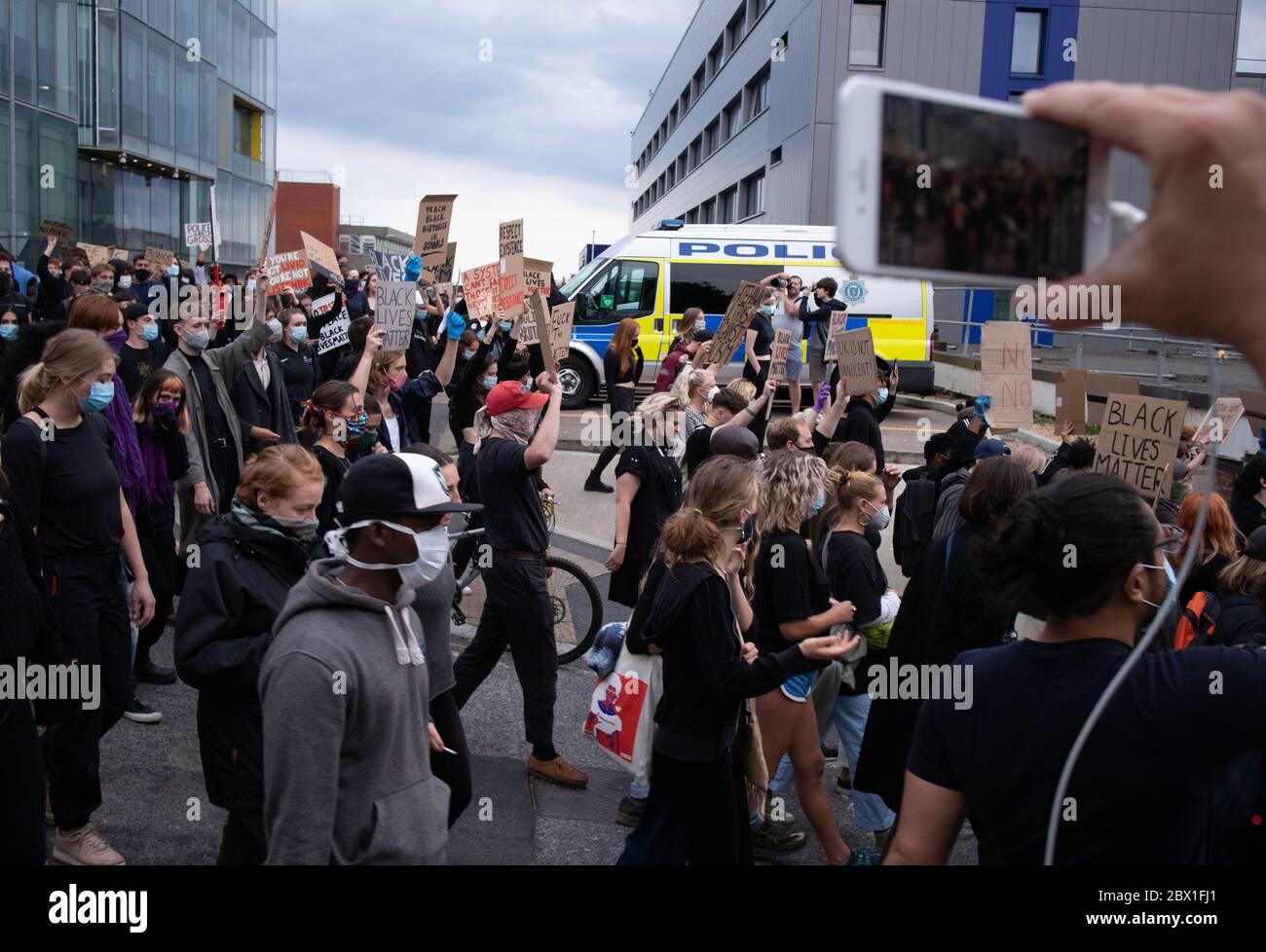 Protesters kneeling outside Brighton Police Station in solidarity for ...