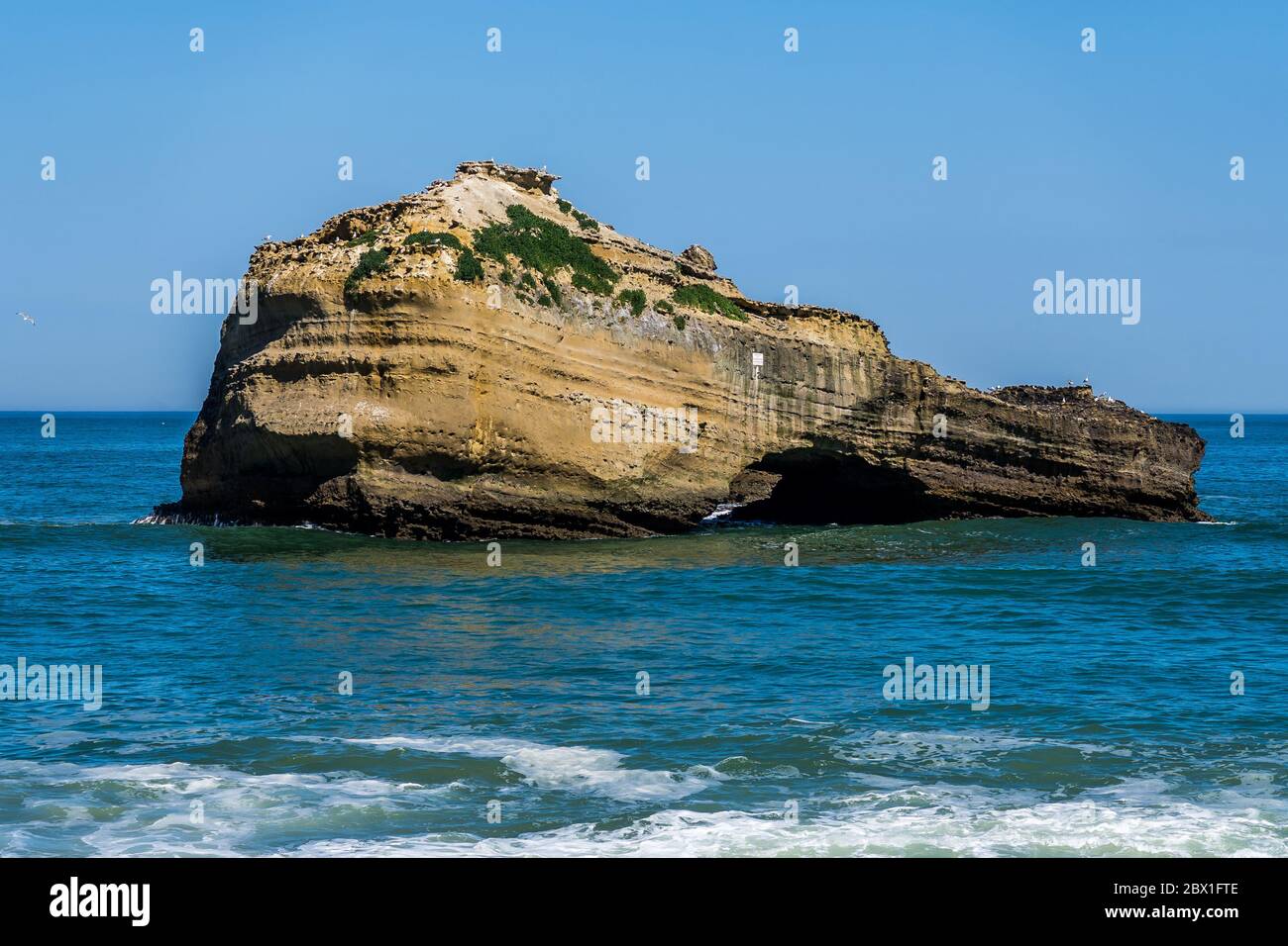 Big rock in the Atlantic ocean. Sea view background. High quality photo ...