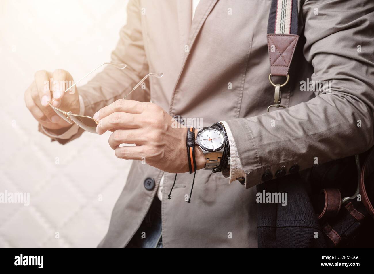 Mans wrist with bracelets hi-res stock photography and images - Alamy