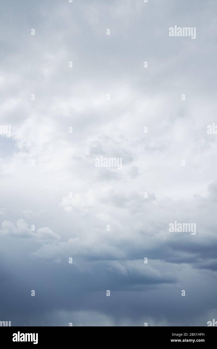 Vertical photo of majestic rain clouds over horizon. Cloudy stormy sky ...
