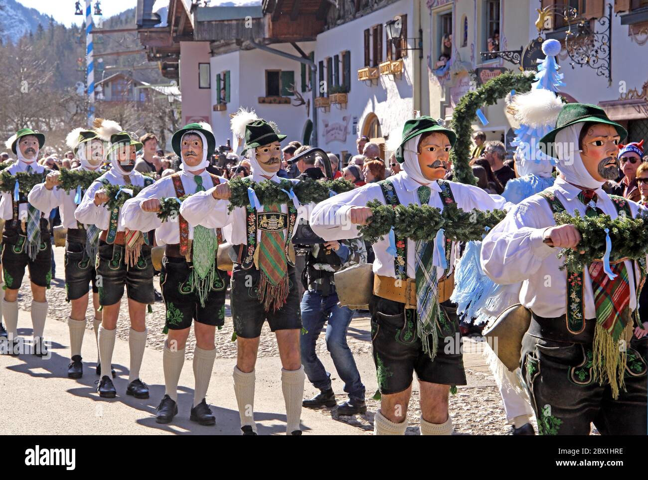 Bell stirrer in the Maschkera procession at carnival, Mittenwald ...
