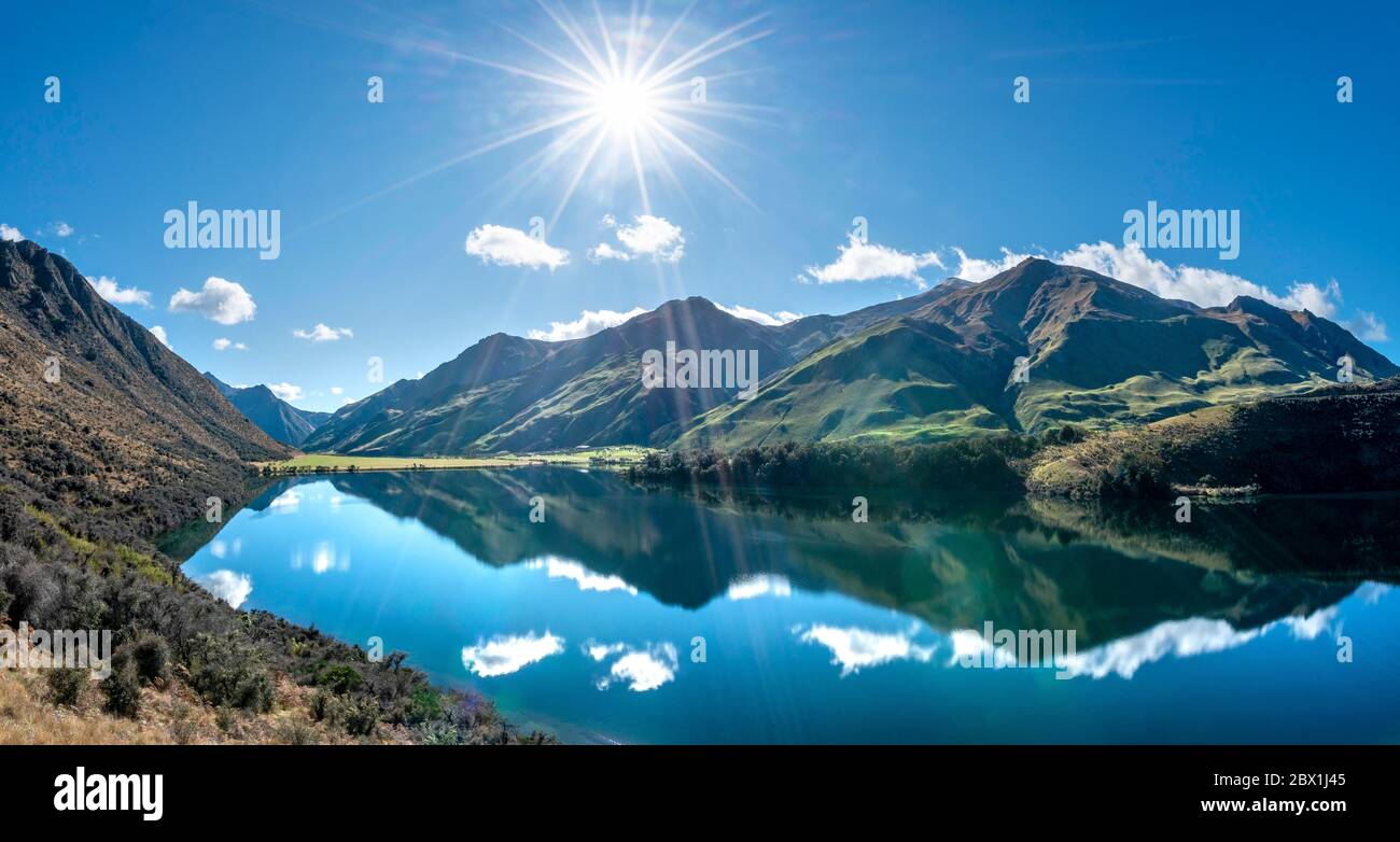 Panorama, mountains reflected in a lake, Moke Lake near Queenstown ...