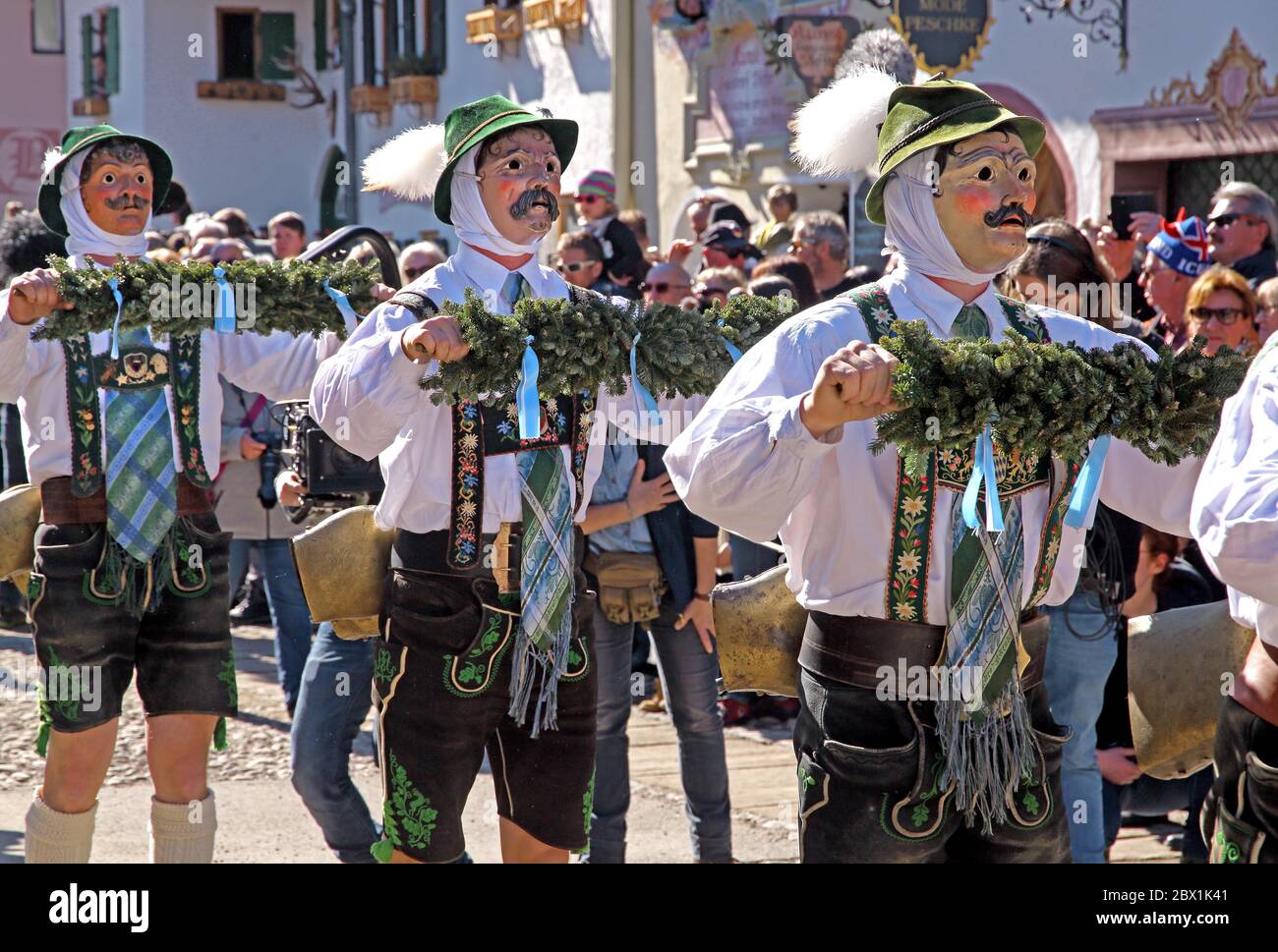 Bell stirrer in the Maschkera procession at carnival, Mittenwald ...