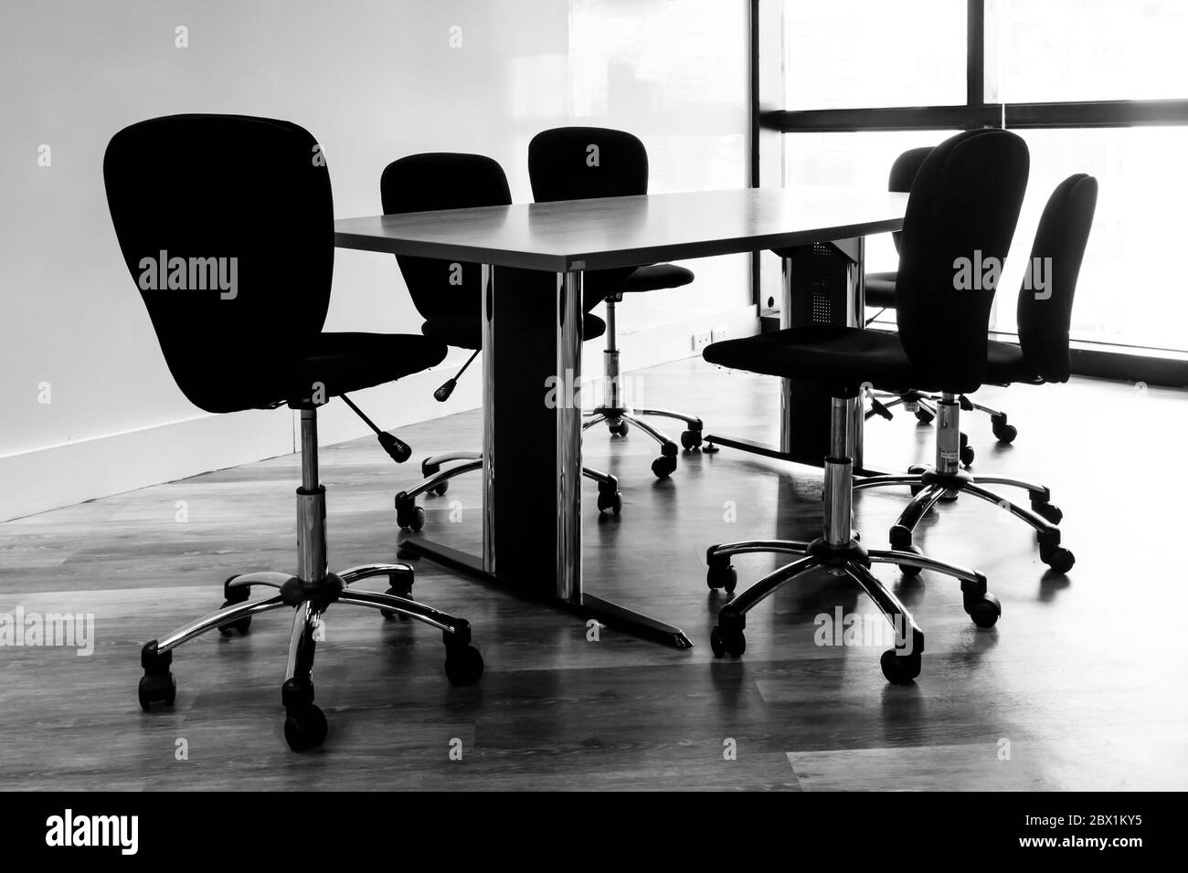 Furniture and room design in indoor seating with windows Black and ...