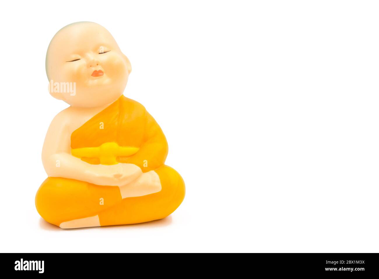 pottery monk on white background Stock Photo - Alamy