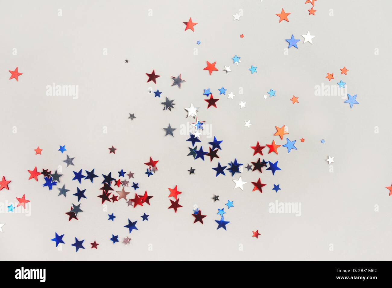 Festive background with confetti in the color of the American flag ...