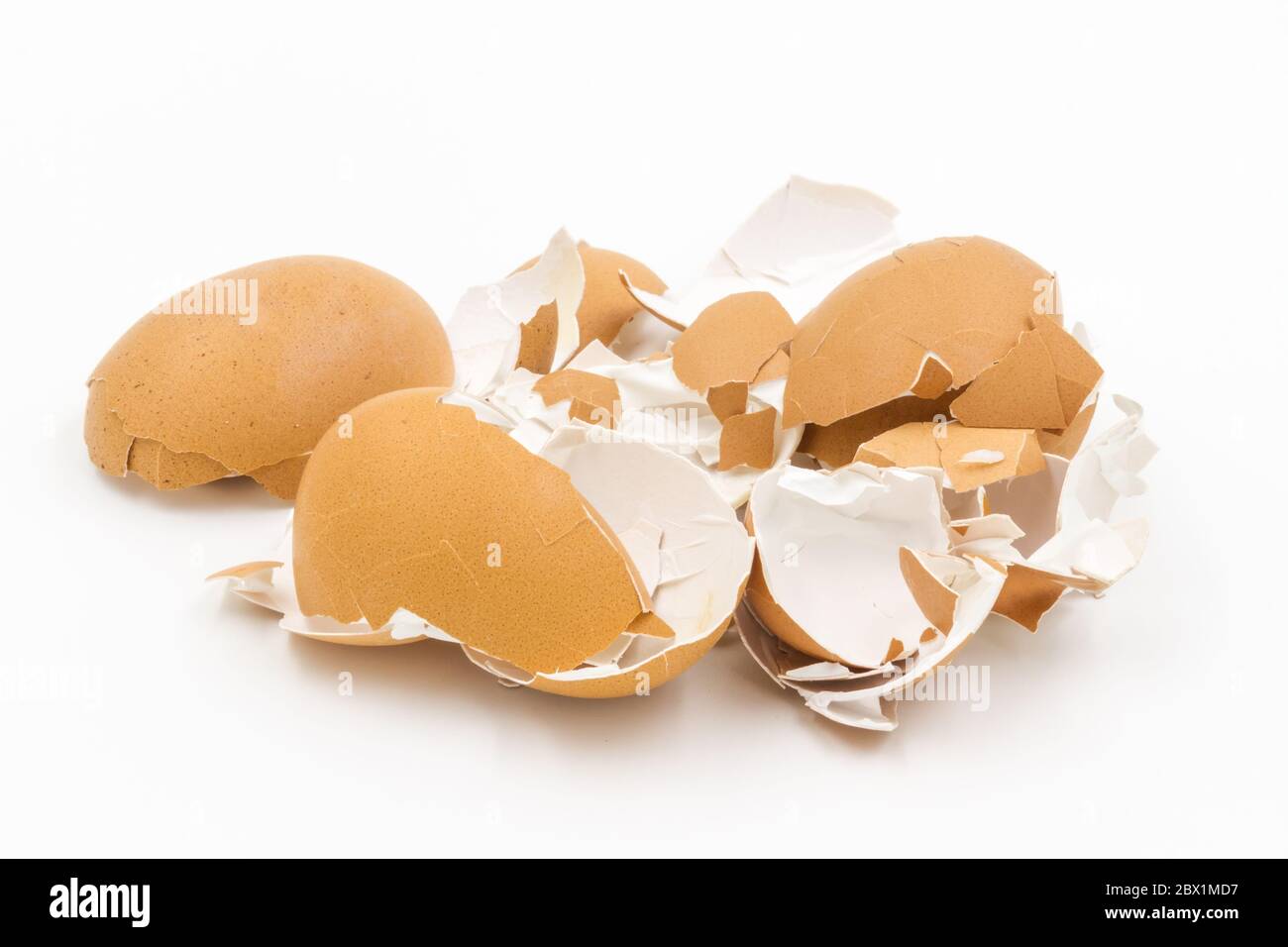 Eggs shell on white background Stock Photo - Alamy
