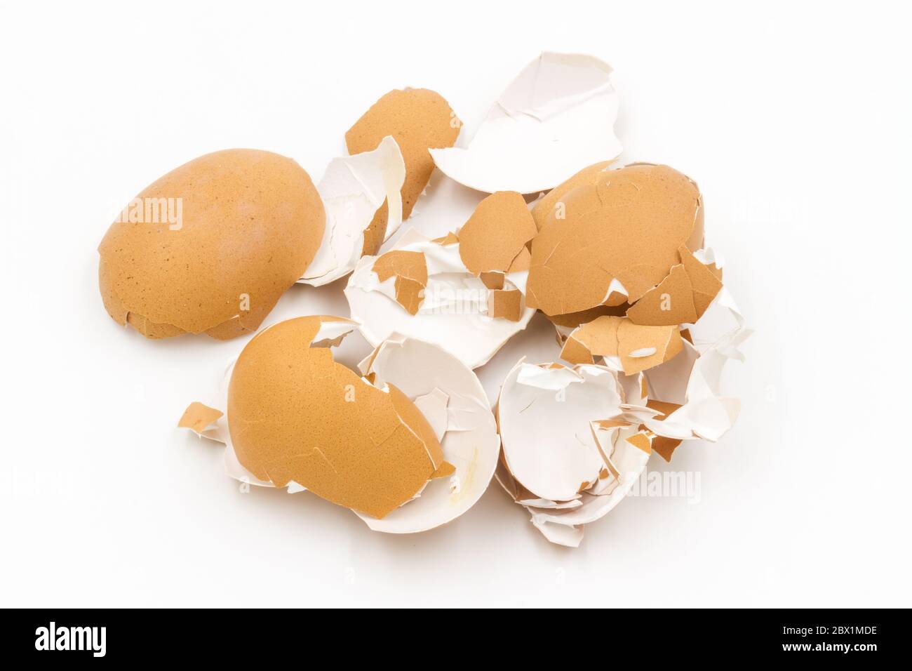 Eggs shell on white background Stock Photo - Alamy