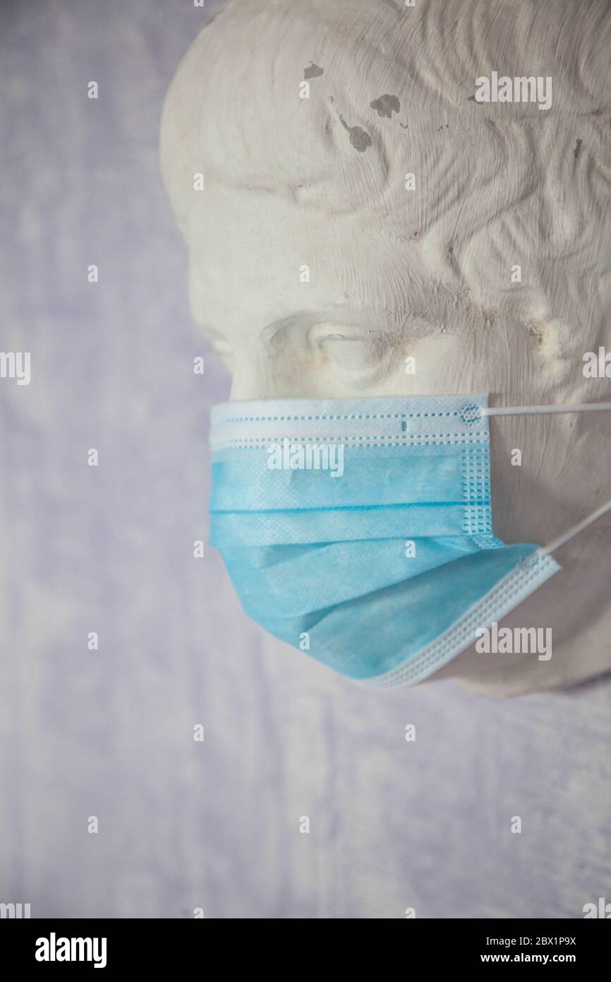 plaster head of an ancient Greek philosopher in a protective medical ...