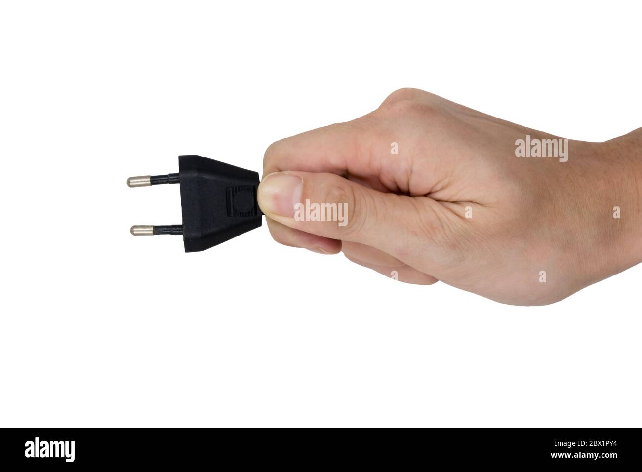 Hand holding electric plug isolated on white background Stock Photo - Alamy