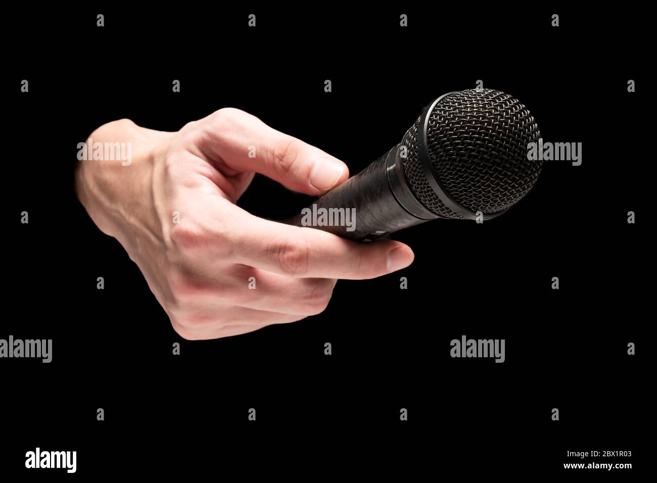 Hand holding microphone hi-res stock photography and images - Alamy