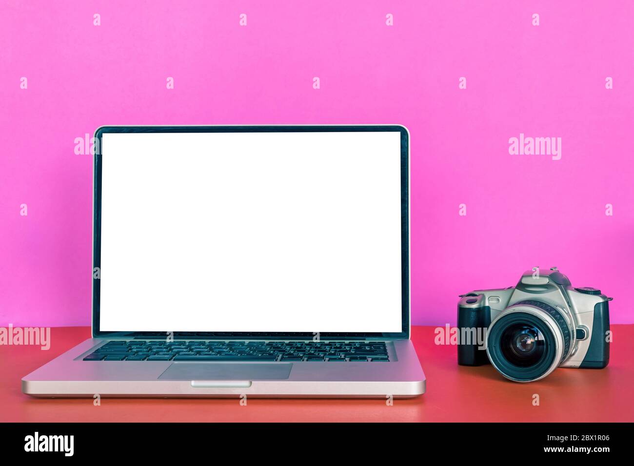 Modern laptop with blank screen, camera on colorful background Stock ...