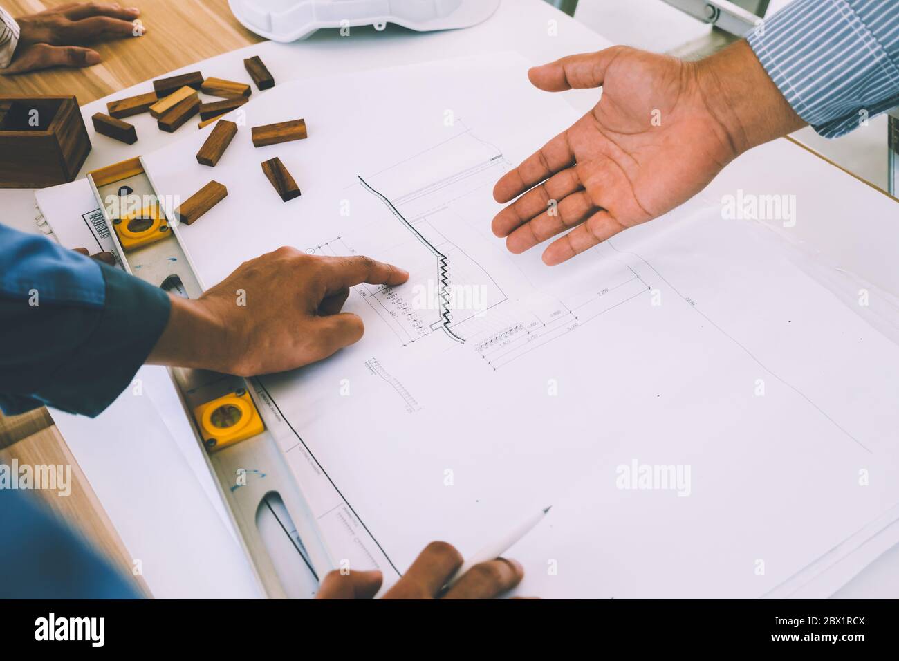 Professional engineers discussing project building hi-res stock ...