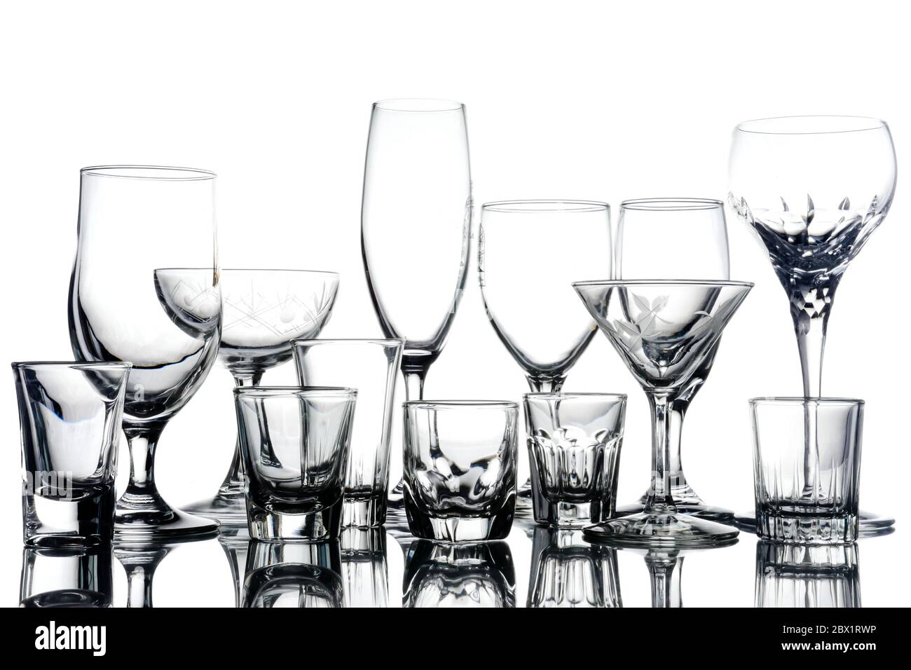 Collage of empty glasses on white background Stock Photo - Alamy