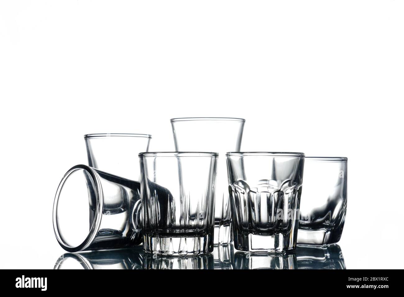 Collage of empty glasses on white background Stock Photo - Alamy